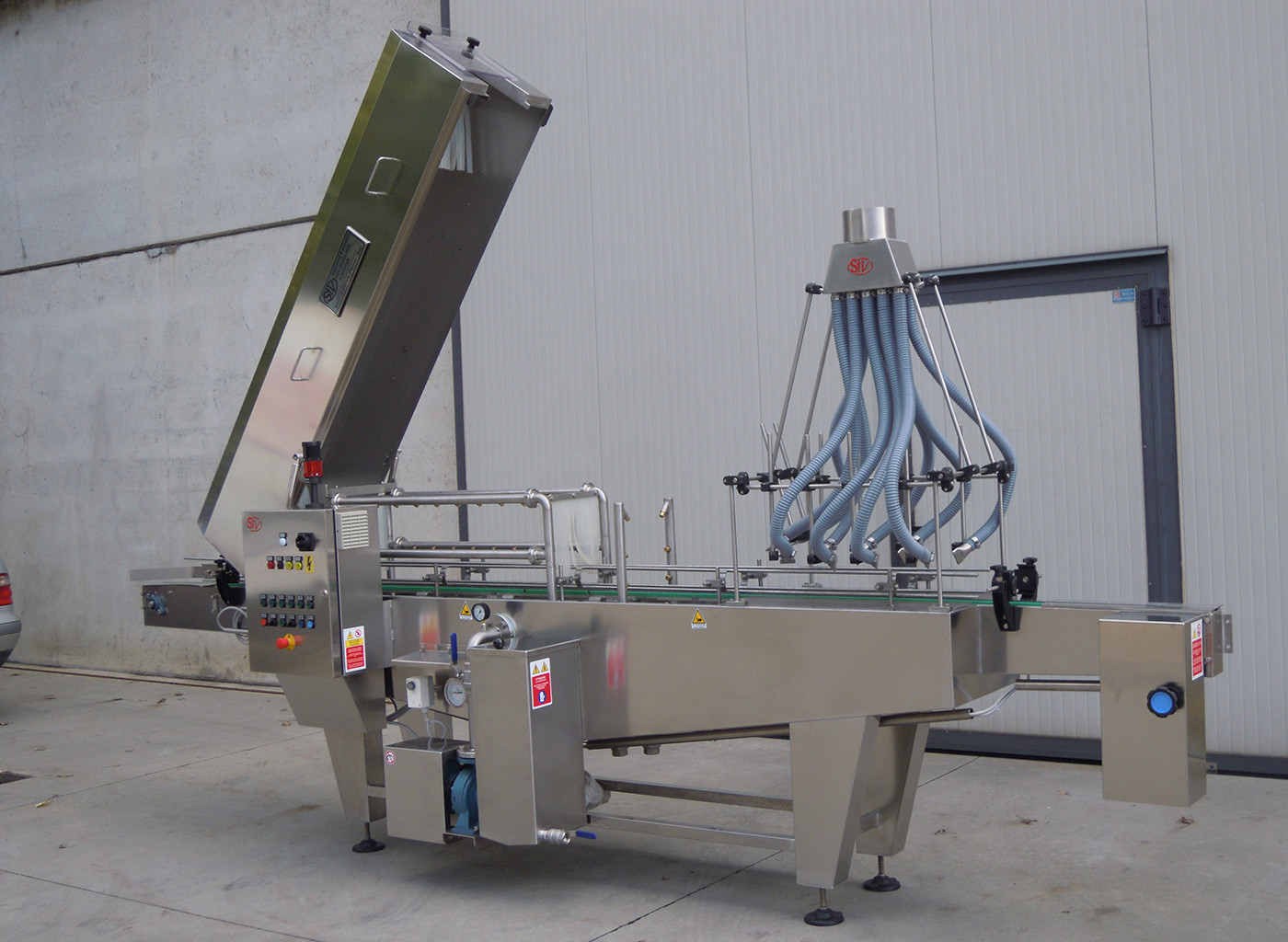 Masina automata de spalat liniar, pana la 8.000 recipiente / ora